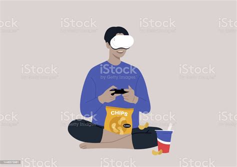 Vr 헤드셋을 착용하고 비디오 게임 콘솔을 플레이하고 간식을 먹고 무선 엔터테인먼트 기술 현대적인 라이프 스타일을 먹는 젊은