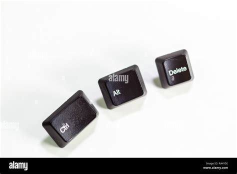 Loose Ctrl Alt Delete Computer Keys On White Background Stock Photo Alamy