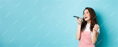 Free Photo Young Woman Using App Translator On Smartphone Speaking