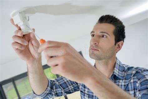 Electrician Fixing Exposed Wiring Stock Image Image Of Plaster