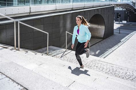 Woman Running Stairs