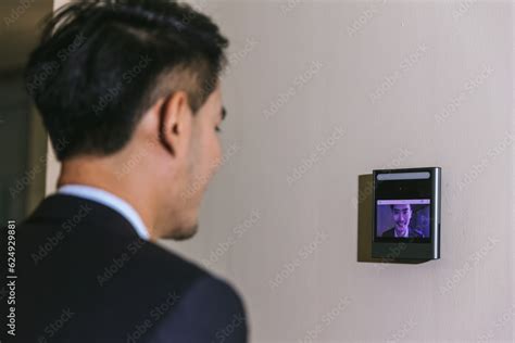 Photo And Art Print Man Using Face Scanner To Unlock Door In Office Building Kanpisut