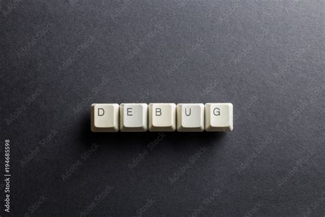 Word Debug Made Using Computer Keyboard Buttons On A Black Background It Technology Concept