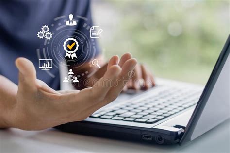 Businessman Hand Showing With Signs Of The Top Service Quality Control Certification Checked