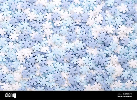 Snowflake Shaped Sugar Sprinkles Background Of Blue And White Confetti Candy Confectionery
