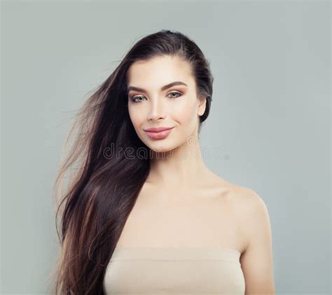 Cute Brunette Woman With Long Dark Smooth Straight Healthy Silky Hair