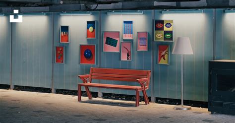 Art Is Displayed Near A Bench In An Underground Passage Photo Free