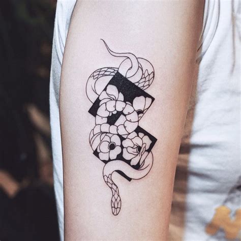 16 Beautiful Negative Space Tattoos To Inspire Your Next Ink