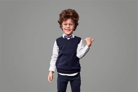 Premium Photo Cheerful Nerd Pointing Aside