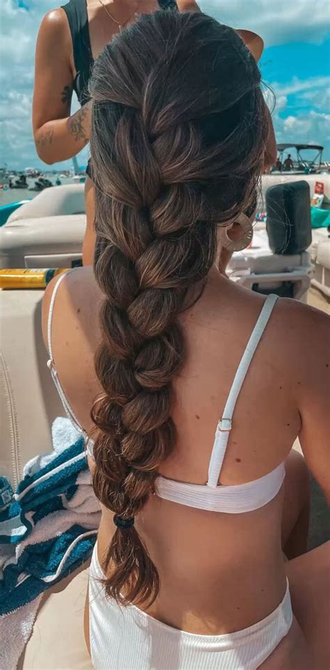 45 Cute Hairstyles For Summer And Beach Days Messy Low Bun