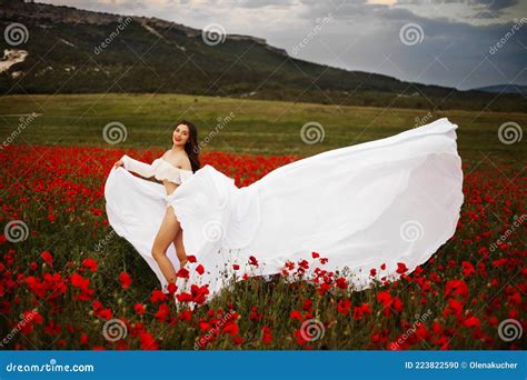 Sexy Blonde Like A Doll In The Bathroom On A Gold Background In Gold