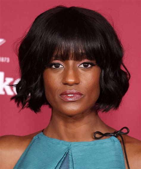 Skye P Marshall Choppy Chin Length Bob With Blunt Bangs And Curls