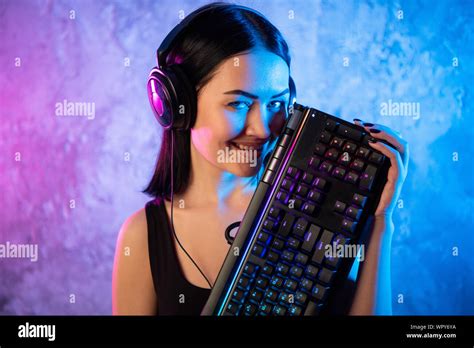 Funny Nerd Girl Wearing Glasses Carrying Computer Keyboard Stock Photo Alamy