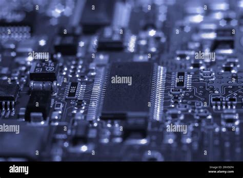 Intricate Circuit Board With Computer Hardware Showcasing Complexity Of Electronics Industry