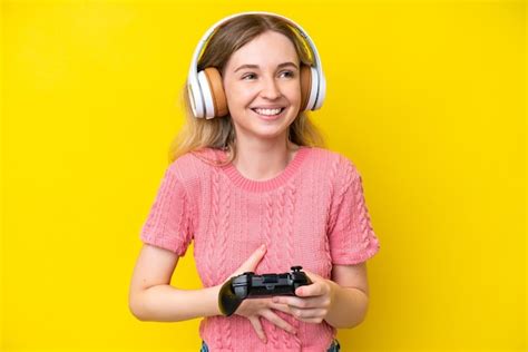 Premium Photo Blonde English Young Girl Playing With A Video Game