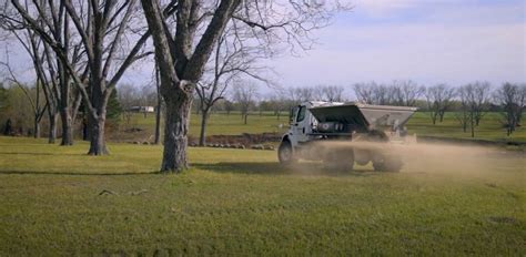 Spreading Fertilizer On Pecan Trees Bag A Nut