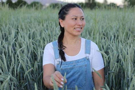 A Woman With Denim Overalls In The Fields Stock Image Image Of