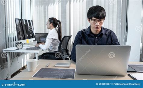 Team Of Two Professional Programmers Working On Website Projects In