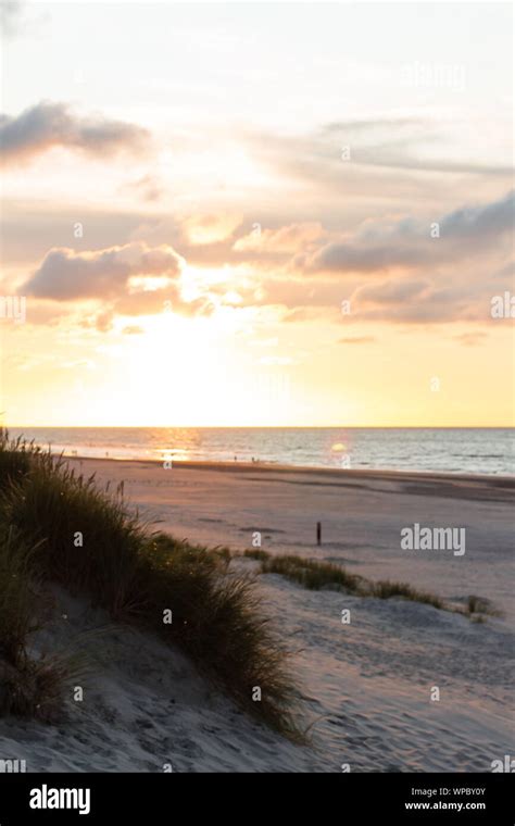A Beautiful Sunset At The Beach Of Ameland Friesland North Sea White