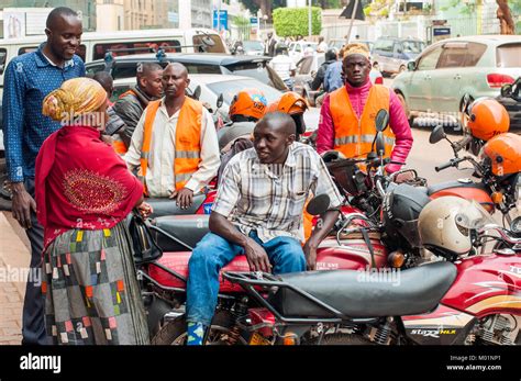 Street Scene With Boda Boda Motorcycle Taxis Kampala Uganda Stock