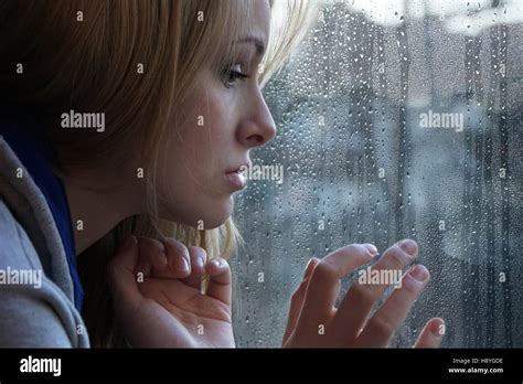 Woman Sad Looking Out Window