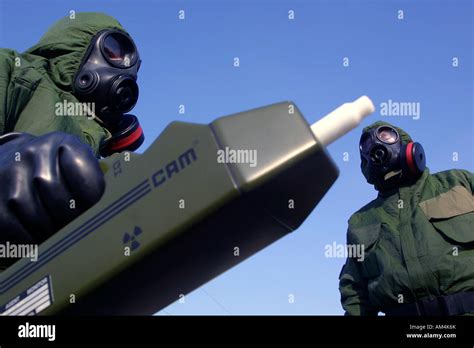 British Policemen Wearing Bioterrorism Protection Suits And Carrying