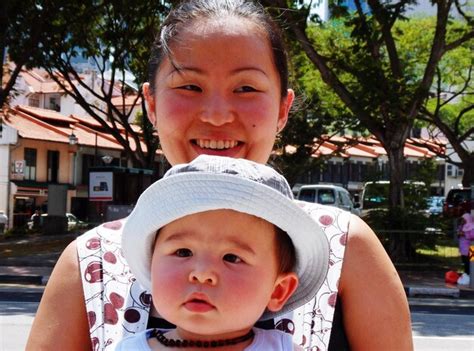 Premium Photo Close Up Of Young Woman With Son
