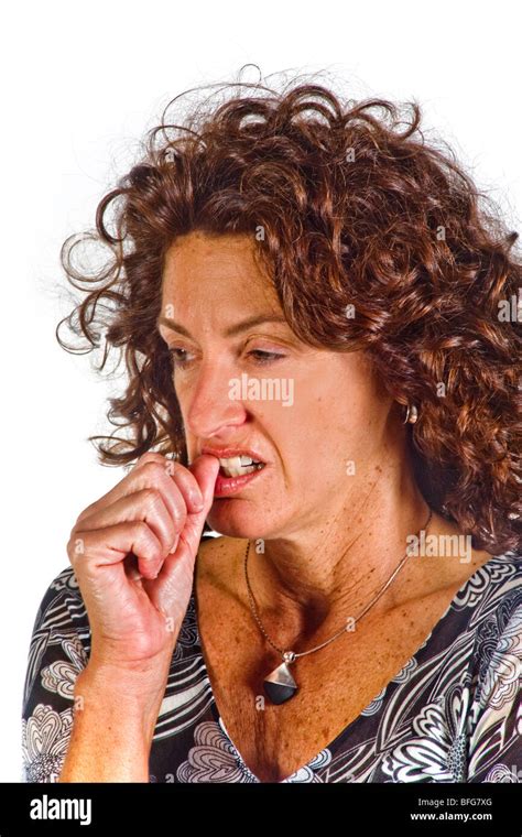 By Biting Her Fingernails A Woman Communicates Insecurity And Nervousness In Nonverbal Body