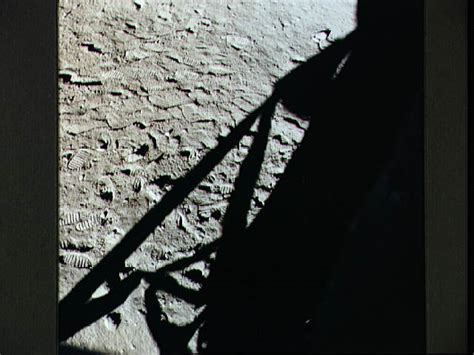 Shadow Of The Apollo 11 Lunar Module Silhouetted Against Moons Surface