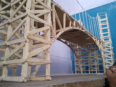 a bridge built using ice cream sticks thread and glue r pics