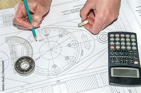 Engineering Drawings With Human Hands Drawing A Project By Pencil On