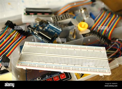 Electronics Components Breadboard In Box With Jumper Wires And Breadboard Symbolizing Diy