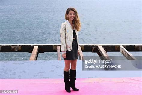 Moroccan Director Sofia Alaoui Poses For Pictures As She Arrives For
