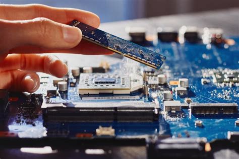 Technician Plug In CPU Microprocessor To Computer Motherboard Stock Photo Image Of Details