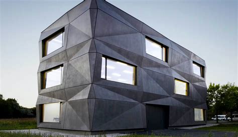 اصول طراحی و اجرای نمای سیمانی ساختمان هادی کریمی