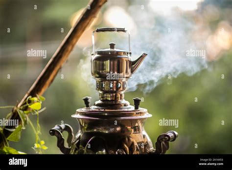 Traditional old metal russian samovar. Tea time Stock Photo - Alamy
