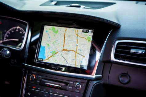 Car Dashboard With Gps Device In The Center Of The Dashboard And Map In The Center Of The Dash Car Dashboard With Gps Device In The Center Of The Dashboard And Map In The Center Of The Dash