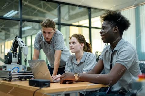 Premium Photo Trainee Robotics Engineer Learning With Programming And