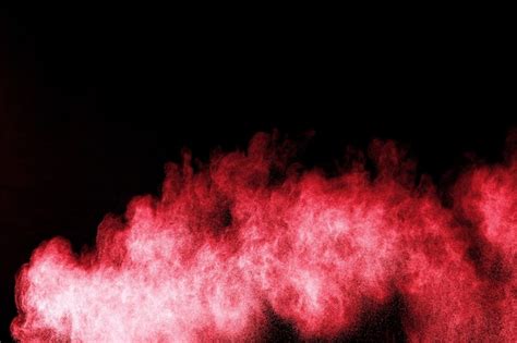 Premium Photo Launched Colorful Red Dust Particles Splashing