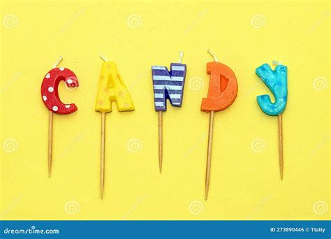 Candy Word Spelled Out In Large Bold Thick Text Font With Orange And