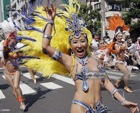 Japanese Samba Dancers Perform At A Parade As Part Of The Annual