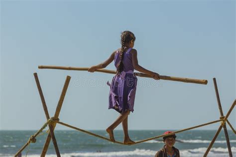 Girl Acrobat On The Beach Along The Coast Of Goa In India Editorial