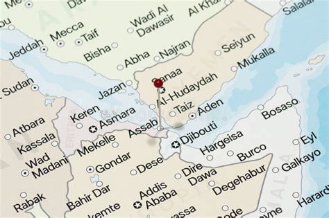 Macro Photo Of A Red Pin Needle Into Assab City Of Eritrea Political Macro Photo Of A Red Pin Needle Into Assab City Of Eritrea Political
