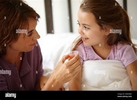 Is This Going To Make Me Better A Mother Giving Her Daughter Medicine
