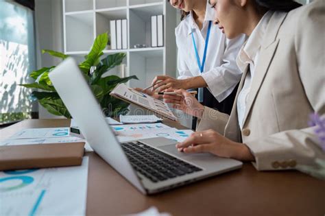 Diverse Business Team Collaborating Financial Analysis Strategy Modern