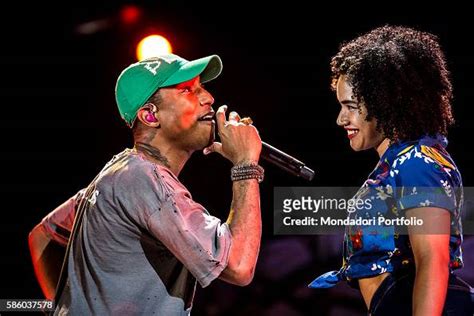 American Rapper Pharrell Williams With A Dancer During His Concert At