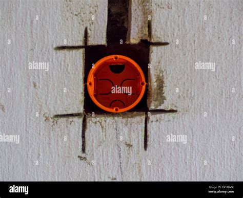 Plastic Backbox For Socket Or Switch Inserted Into The Drilled Hole On