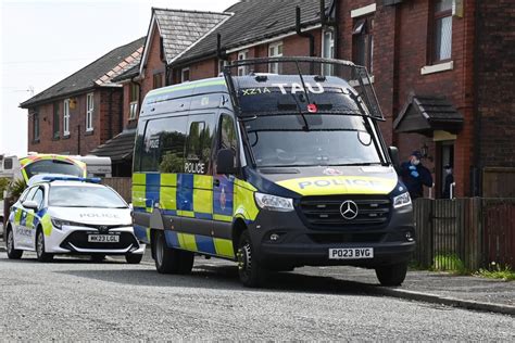 Three Men Charged With Terror Offences Following Raids In Wigan And Bolton