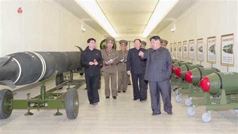 North Korea Unveils New Nuclear Warheads As Us Air Carrier Arrives In South Reuters