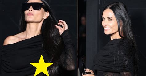 Шикарная Деми Мур попала в очень неприятную ситуацию с платьем на показе мод